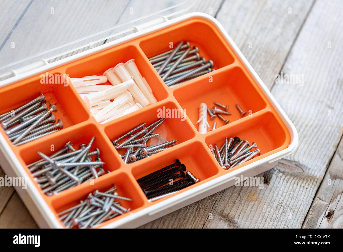 Collection of nails, thumb nails, screws, plastic and bolts in plastic ...
