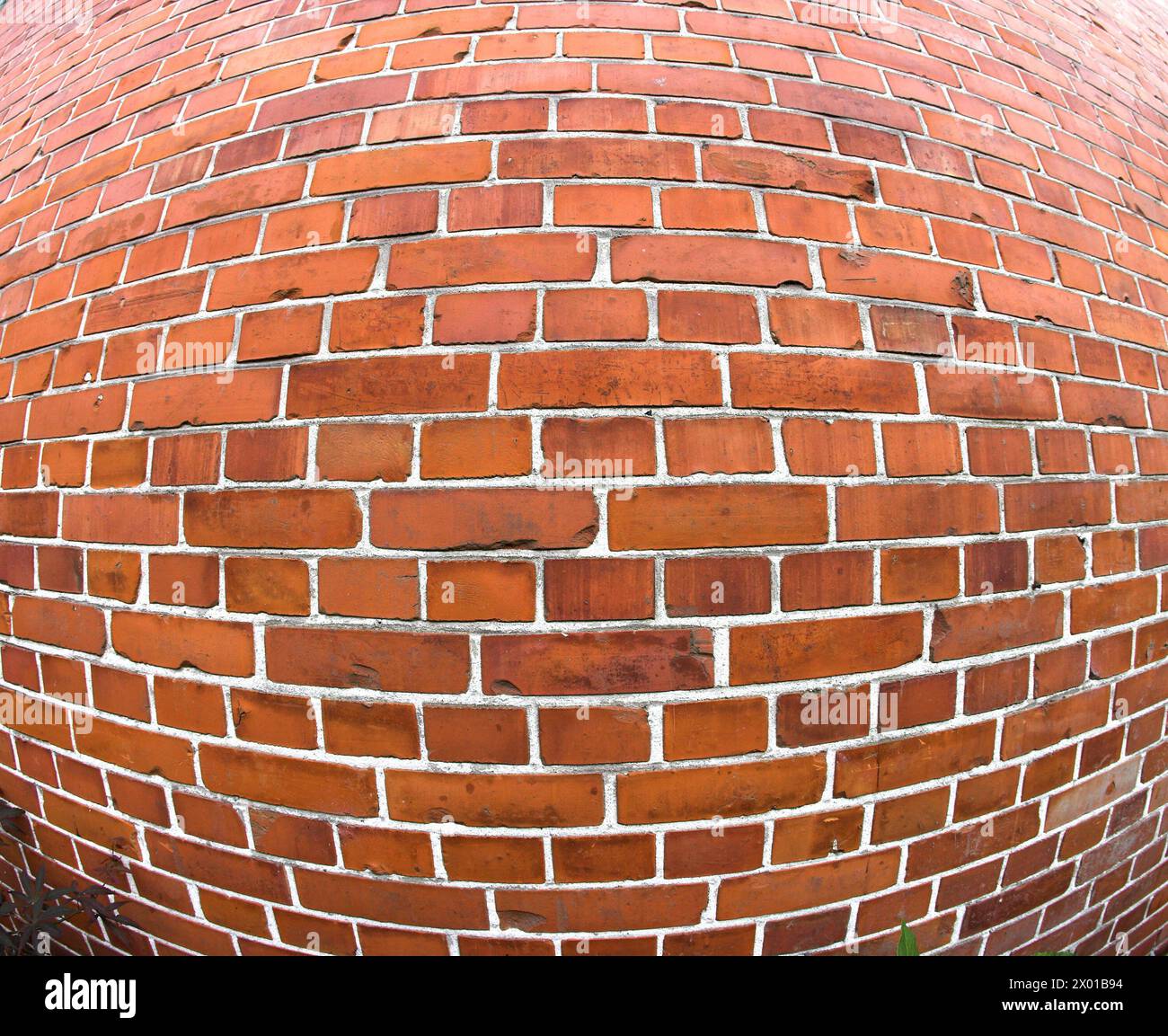 Building, fisheye and closeup of red, brick wall for texture ...
