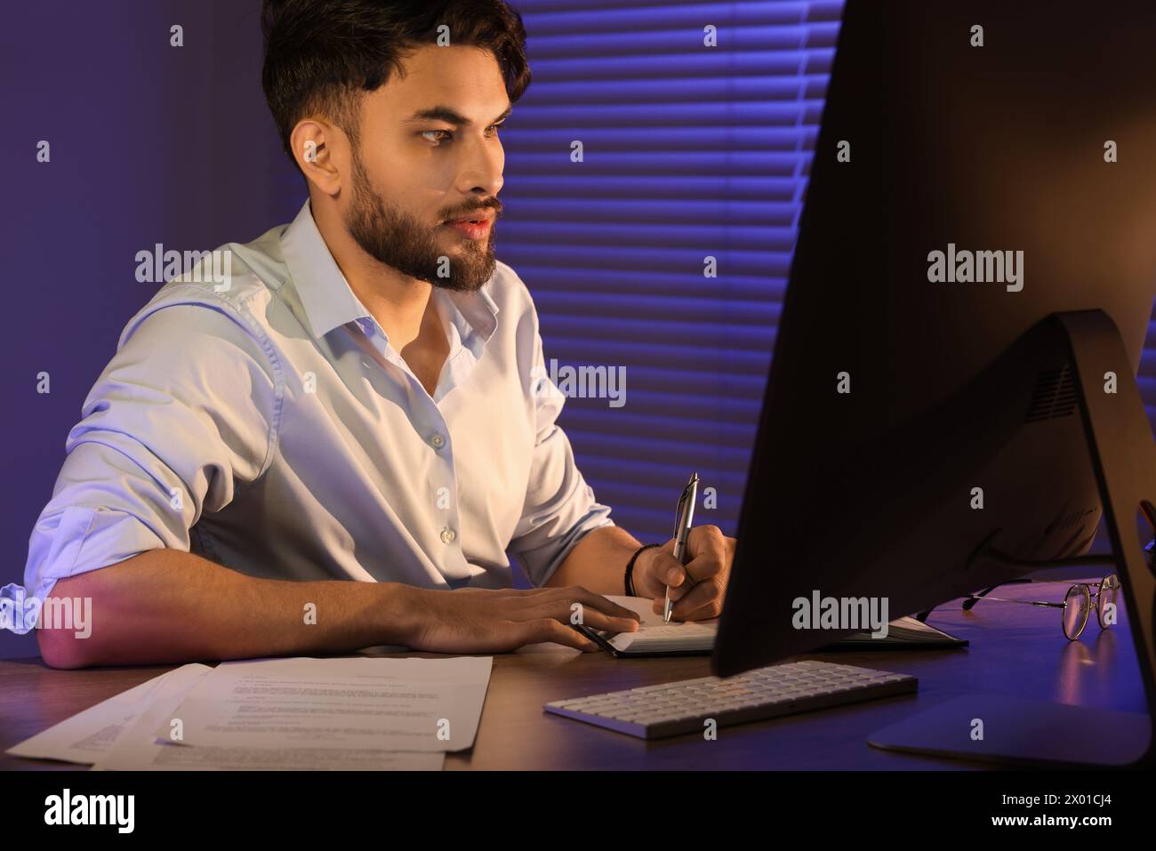 Tired overworked young guy in hi-res stock photography and images - Alamy