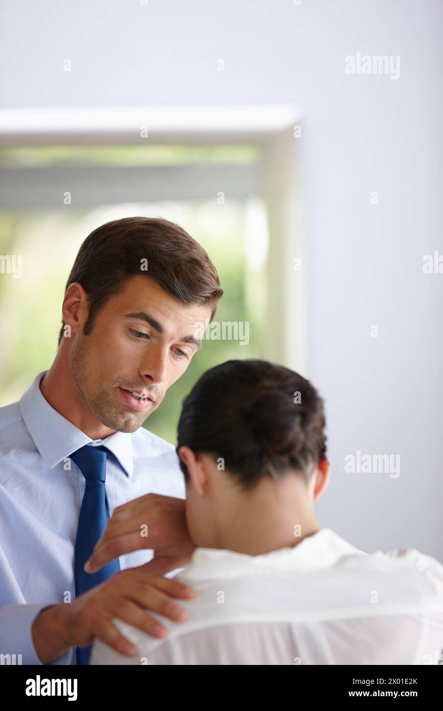 Woman, crying and man comforting for job loss, termination or ...