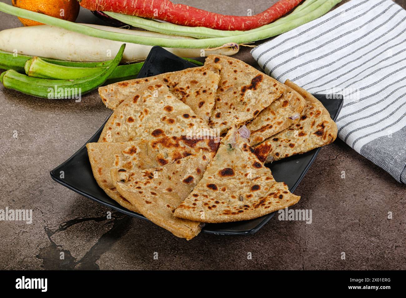 Indian vegetarian Aloo Paratha - bread with potato Stock Photo - Alamy