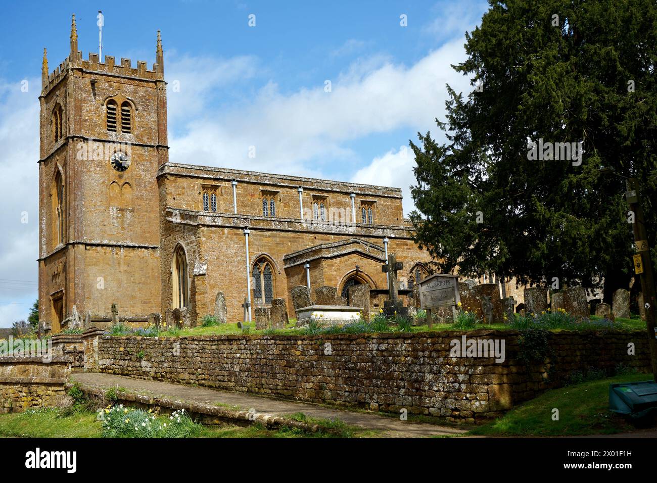 The Early 14th Century All Saints' parish church with cemetery Stock ...