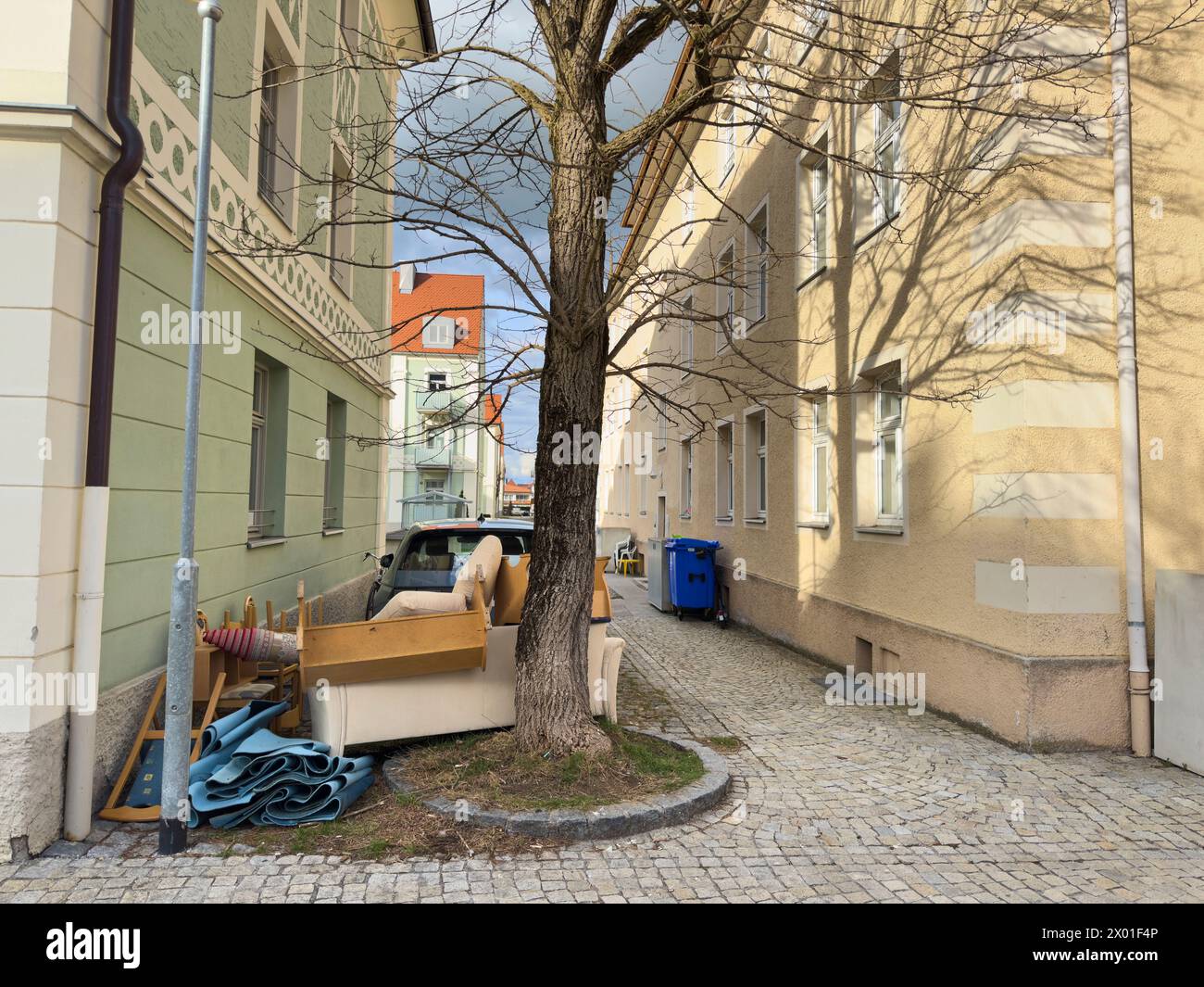 Bulky waste with old furniture lies on the side of the road on Mar 11 ...