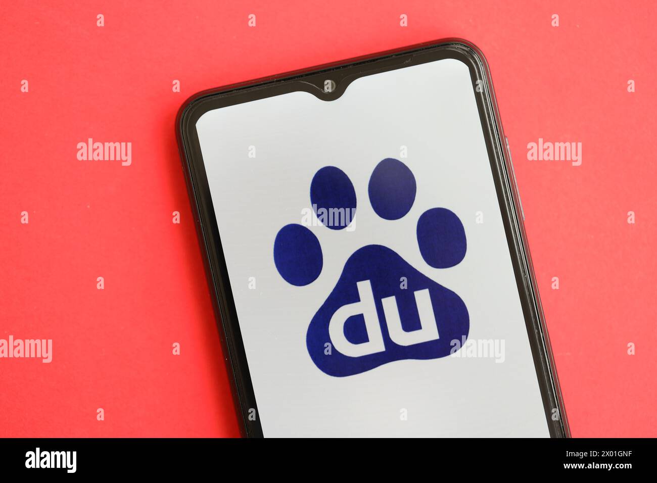 KYIV, UKRAINE - APRIL 1, 2024 Baidu icon on smartphone screen on red ...