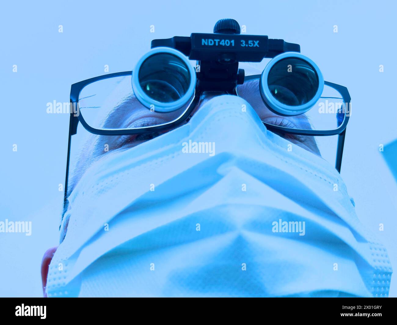 Dentist with magnifying glasses on Feb 28 2024 in Marktoberdorf ...