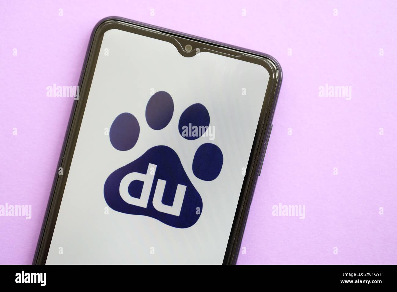 KYIV, UKRAINE - APRIL 1, 2024 Baidu icon on smartphone screen on purple ...