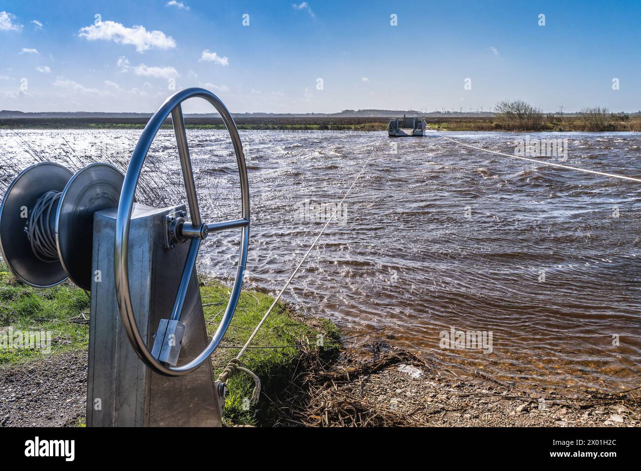 Tugboat hand pulled ferry in Skjern meadows in west Denmark Stock Photo ...