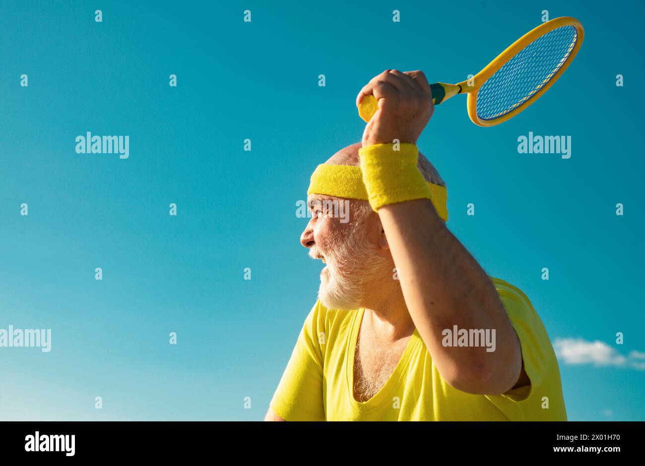 Tennis is fun. Senior man tennis player serving. Healthy and sport ...