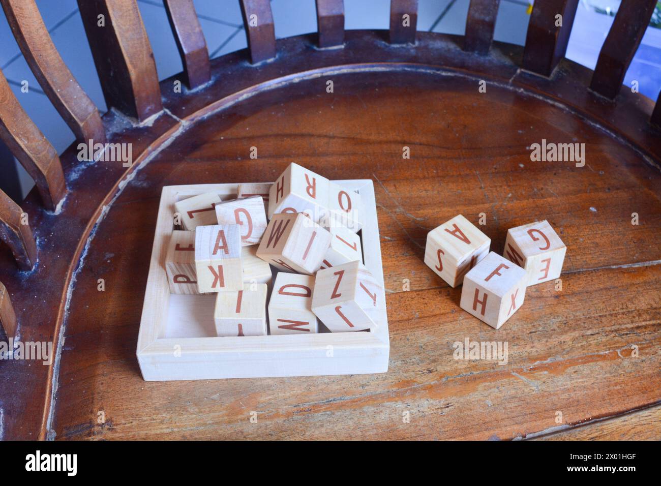 Wooden blocks with numbers and letters to train children to learn motor ...