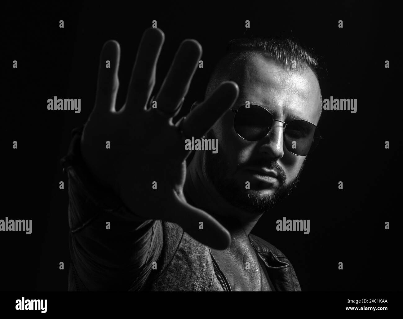 Guy covered face with hands and doing stop gesture with sad and fear ...