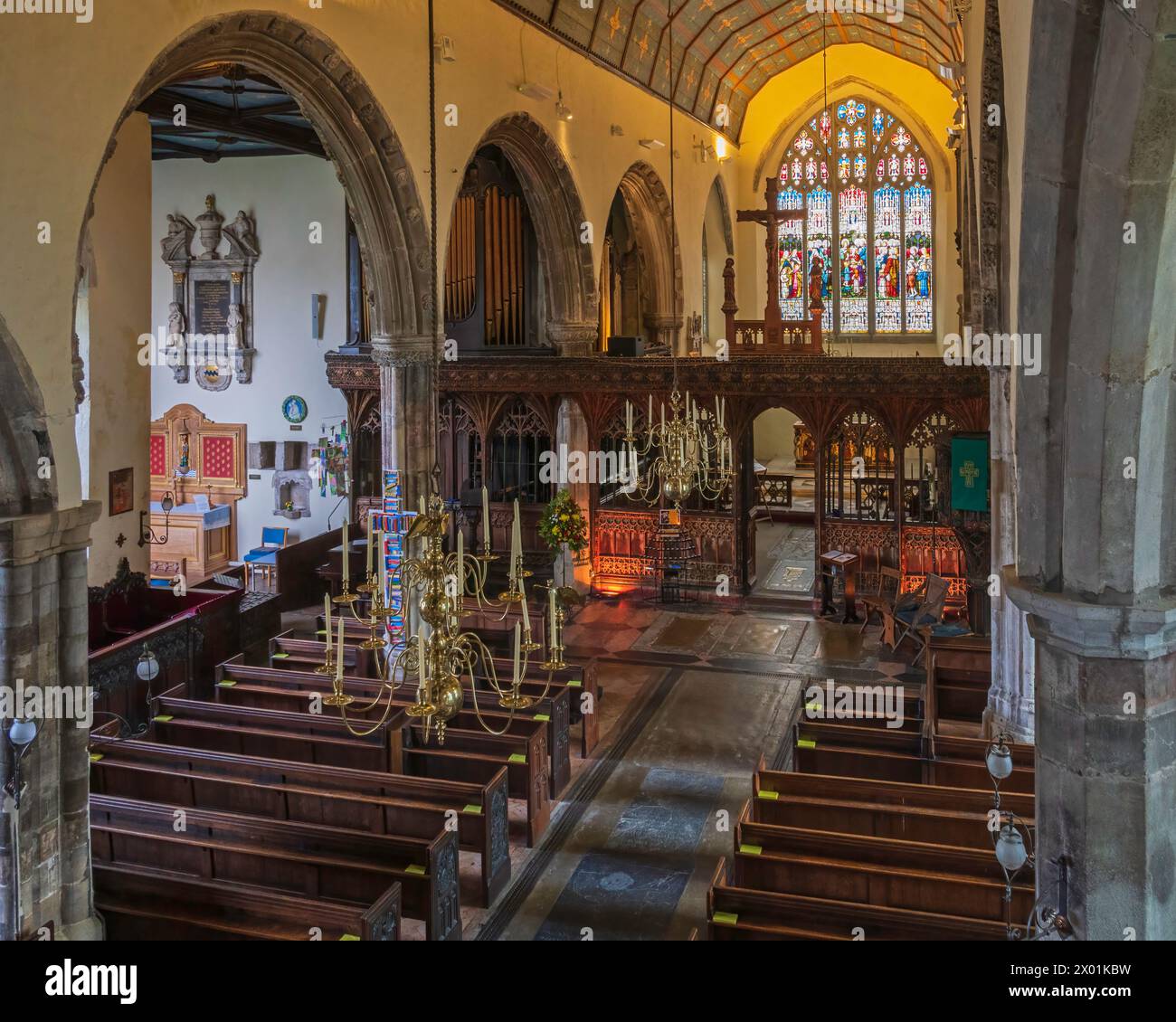 An interior view of the chancel and Rood screen of St Saviours Church ...