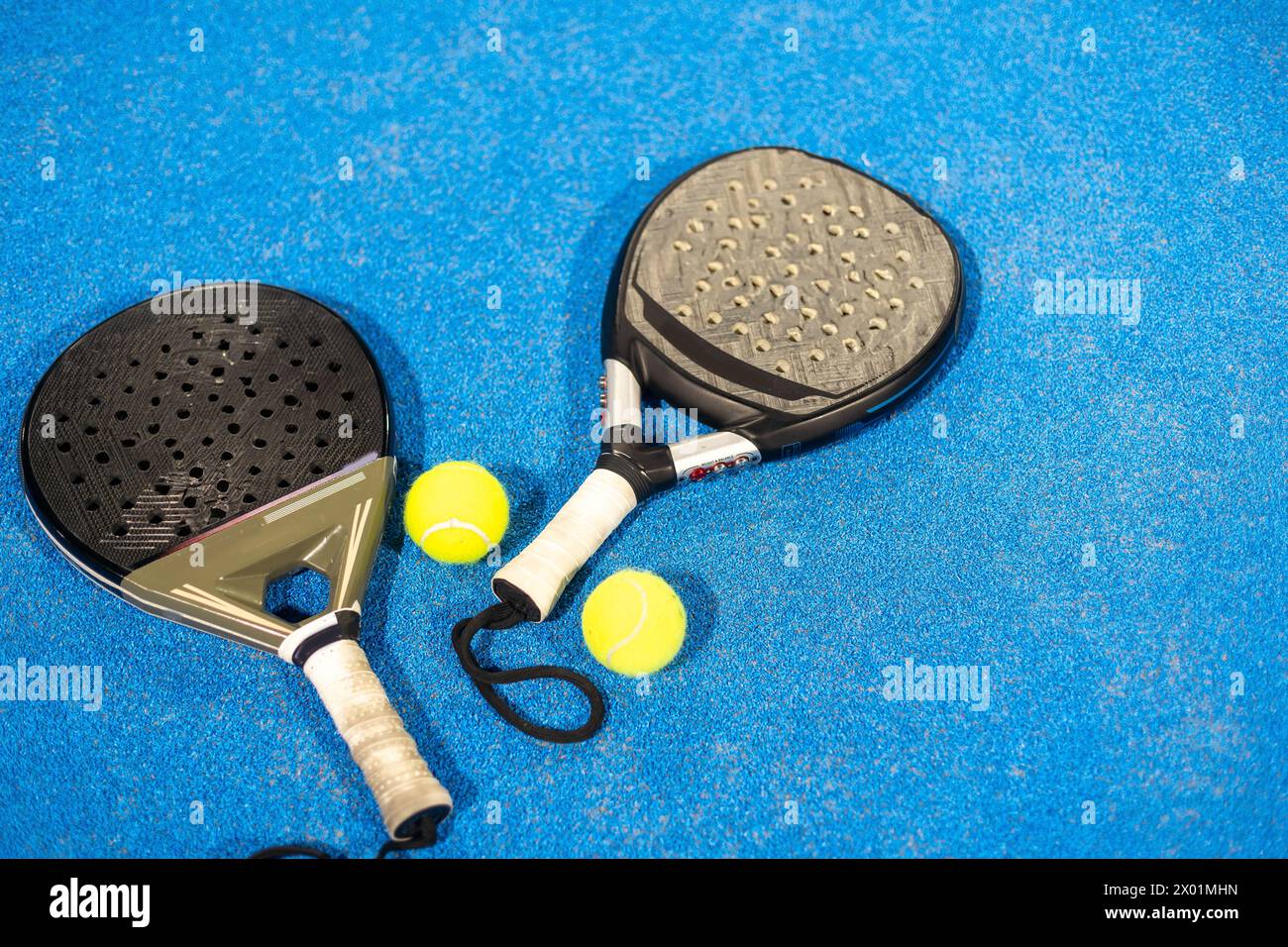 Padel tennis racket. Background with copy space. Sport court and balls ...