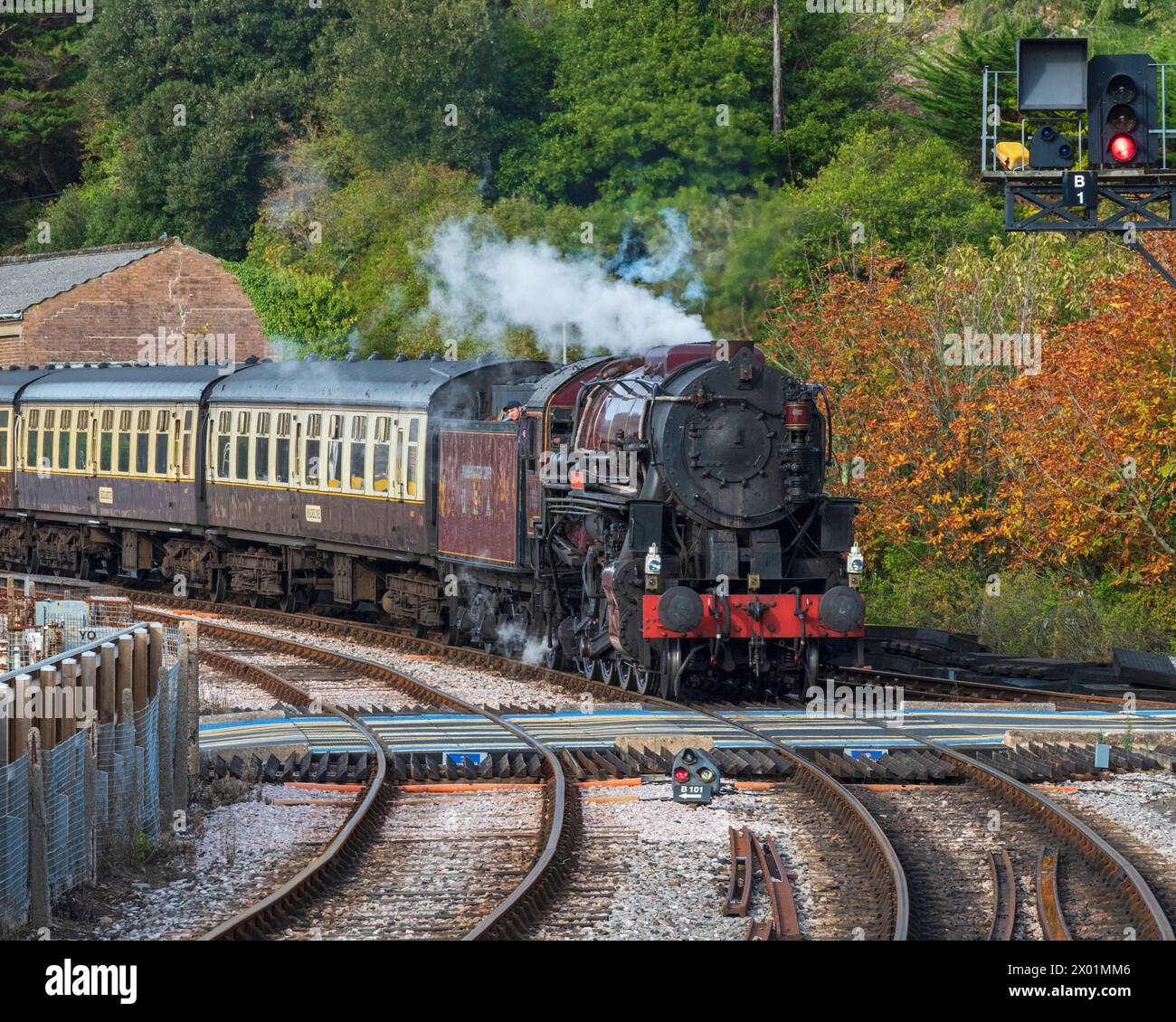 The Omaha steam locomotive pulling a train into Kingswear, Devon ...