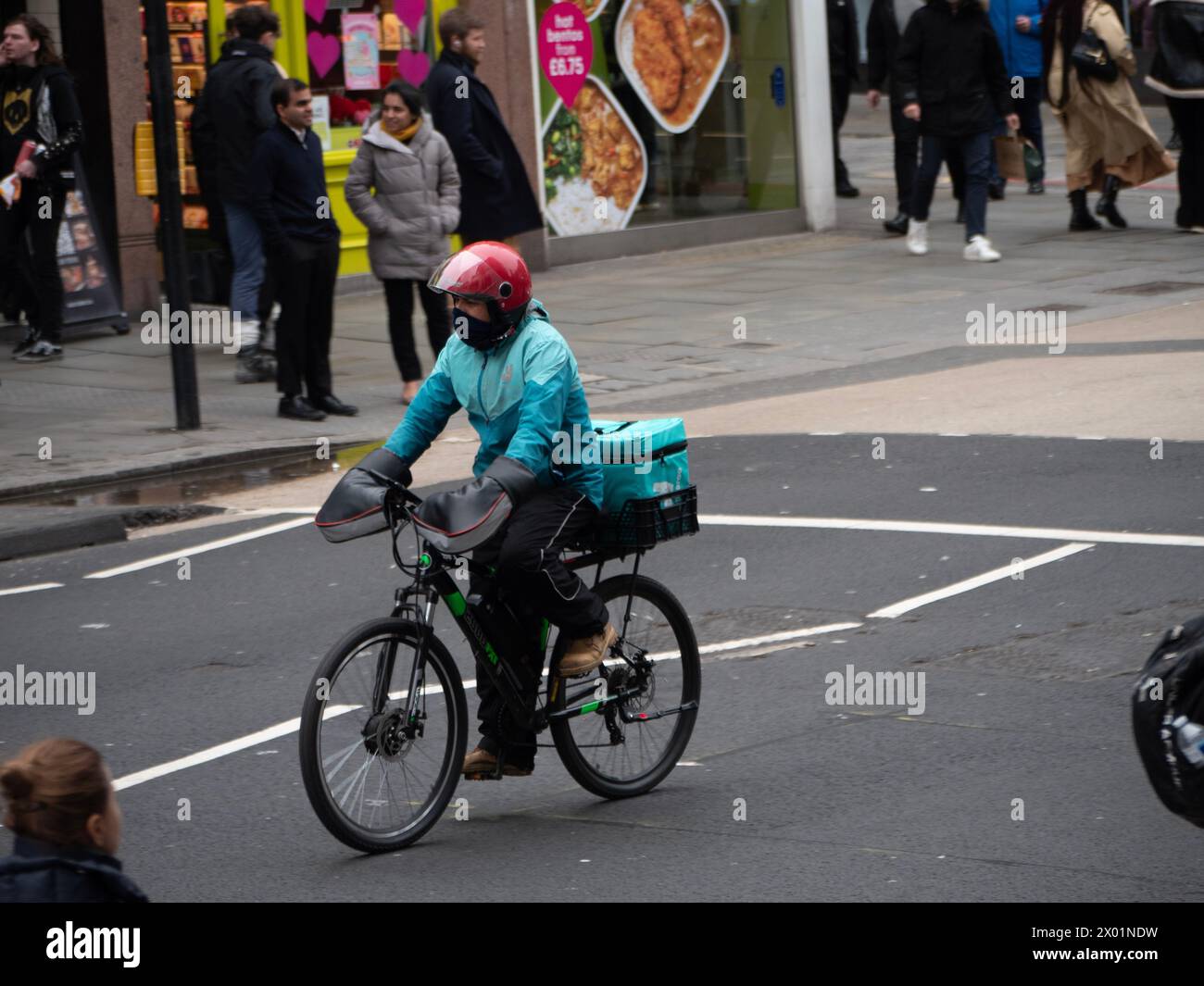 Deliveroo Food delivery cyclist, in Central London Stock Photo - Alamy