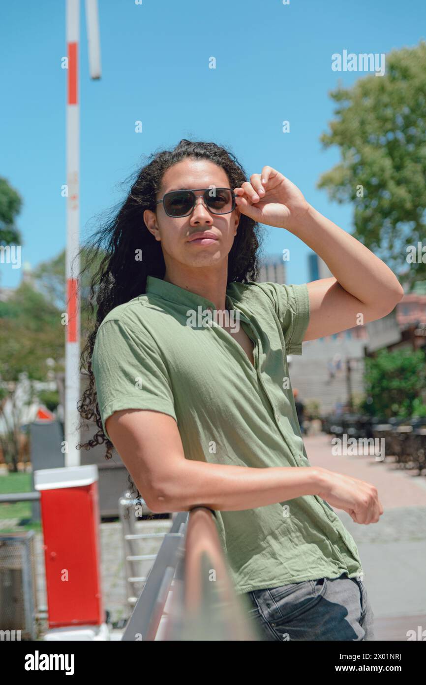 Vertical image of young Latino man of Venezuelan ethnicity, with ...
