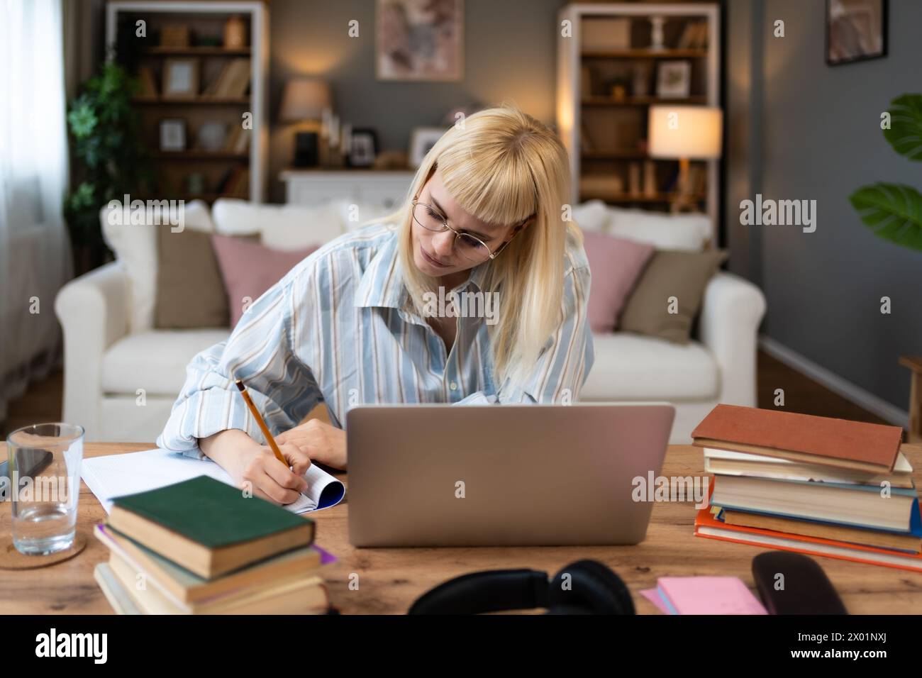Young university student, college woman or girl, study for final exam ...