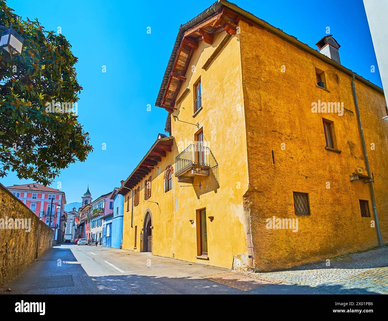 The medieval houses on Via Borghese in old town of Locarno, Ticino ...