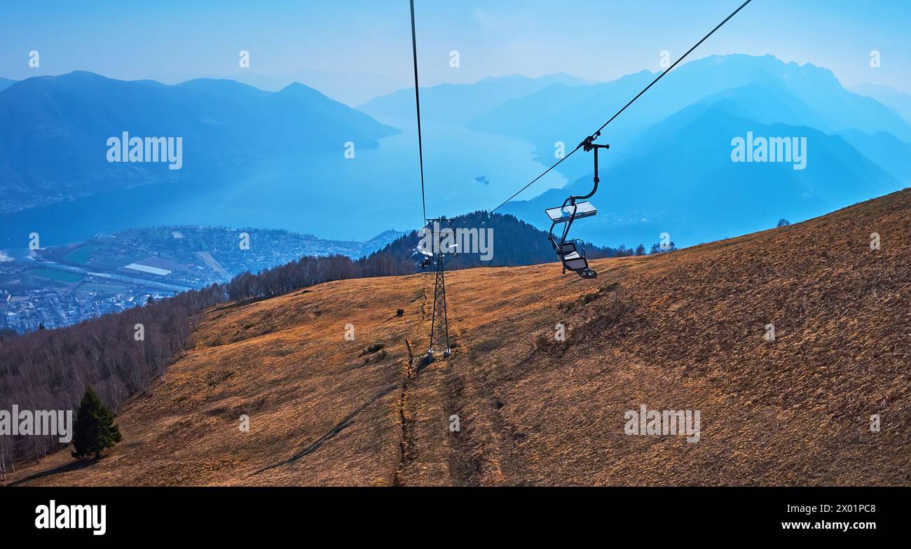 The mountain landscape and hazy blue Lake Maggiore from the Cimetta ...