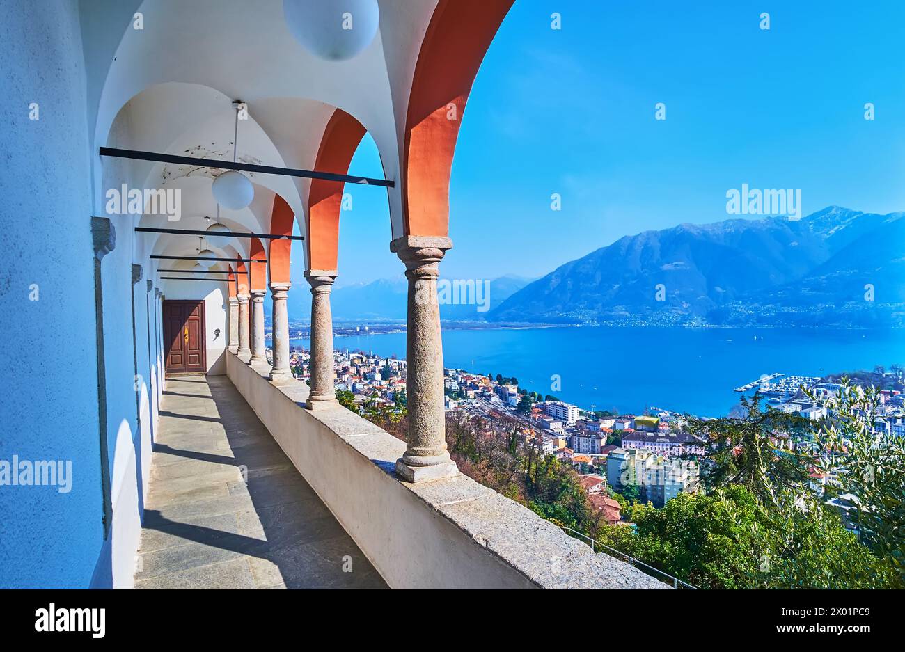 The arched terrace of the Madonna del Sasso Sanctuary offers stunning ...
