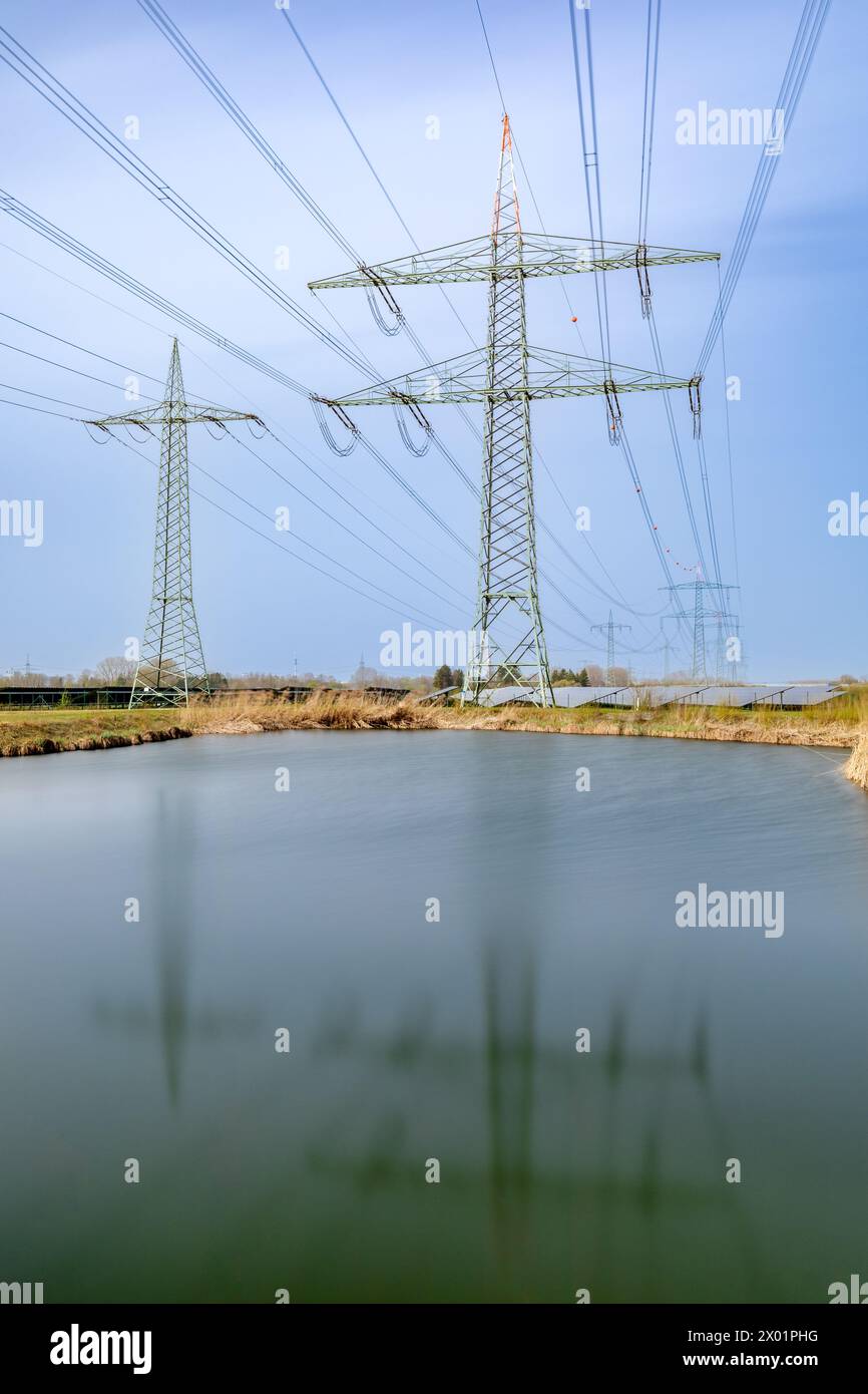 Solar park with pylon in Bavaria, Germany Stock Photo - Alamy