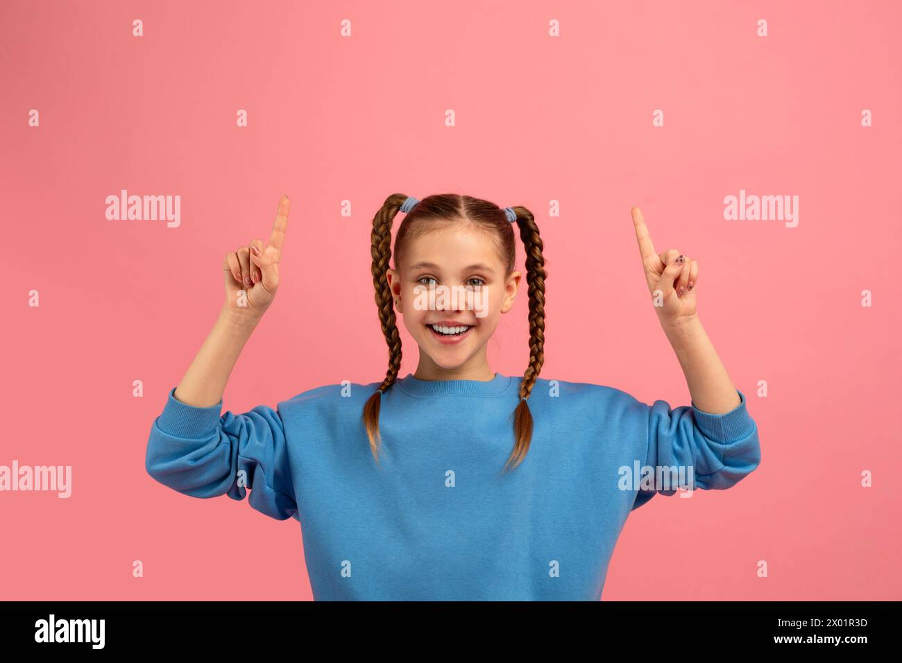 Girl raised index finger hi-res stock photography and images - Alamy