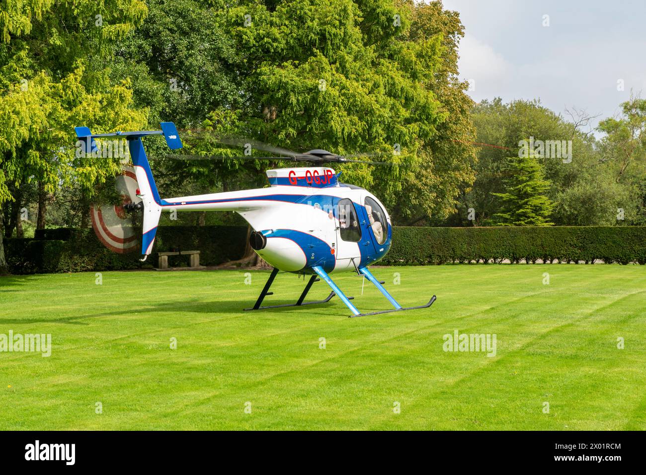 Helicopter landing at a country house Stock Photo - Alamy