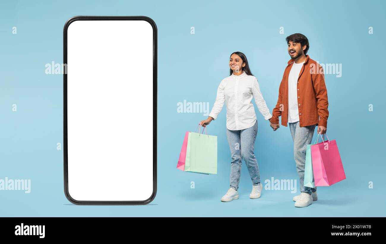 Mockup of a giant smartphone with a couple Stock Photo - Alamy