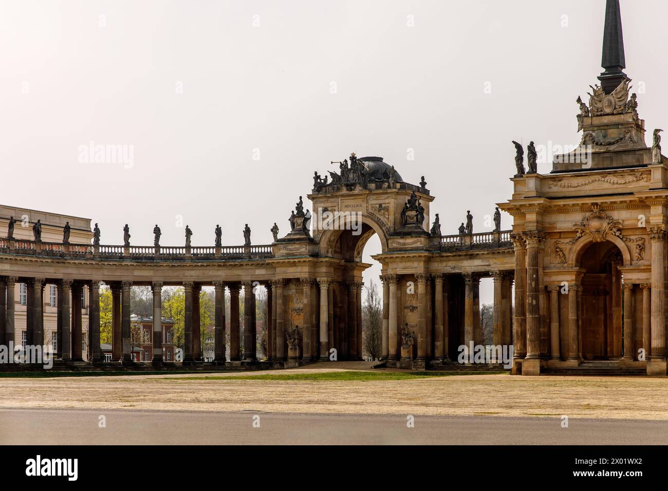 Symmetrical column ensemble with the center arch in the Baroque style ...