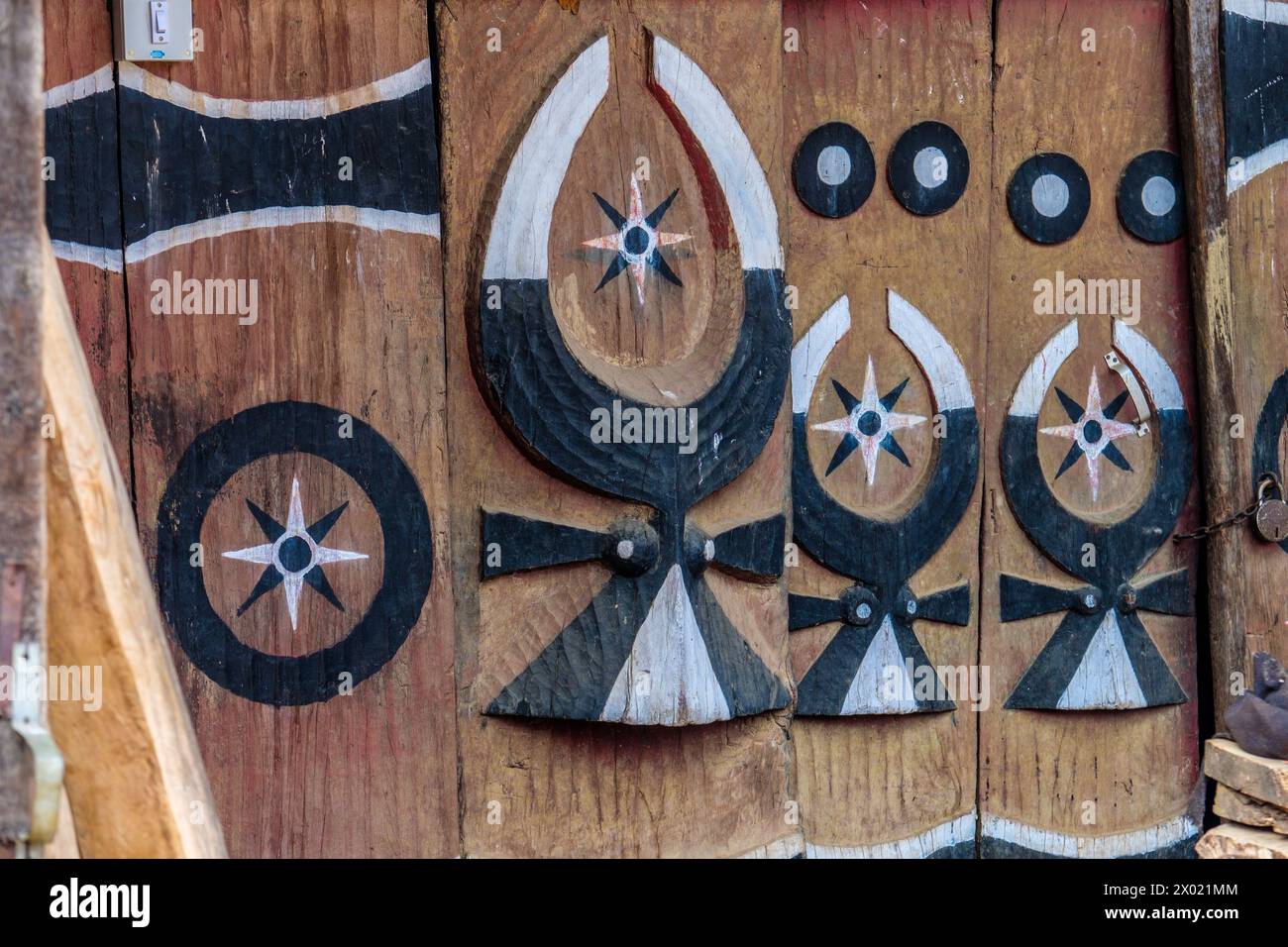 Traditional decorative carvings in Kigwema a Naga village in Nagaland ...