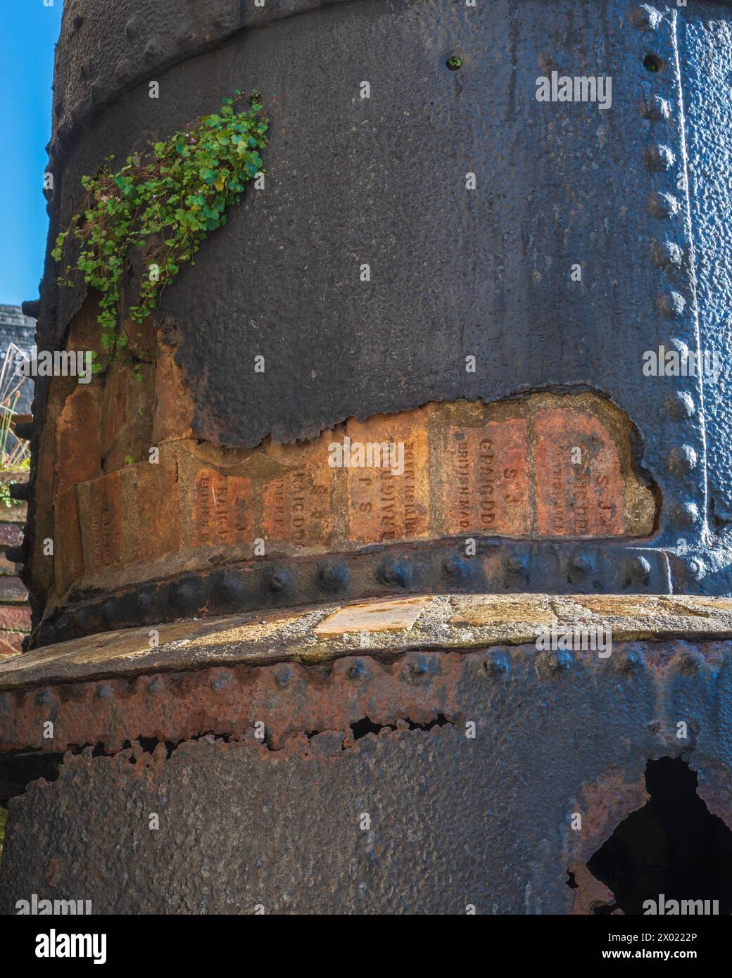 The weathered and corroded base of a chimney stack at the furnaces in ...