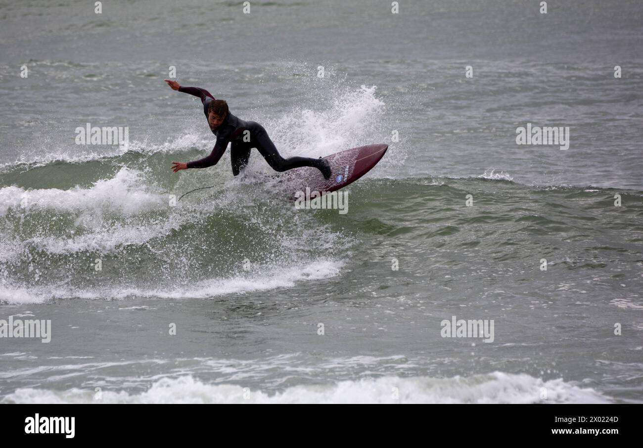 Bournemouth Dorset, UK. 9th Apr, 2024. UK WEATHER Surfers ride the ...