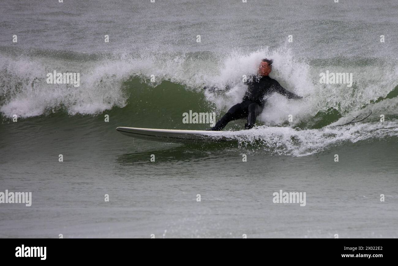 Bournemouth Dorset, UK. 9th Apr, 2024. UK WEATHER Surfers ride the ...