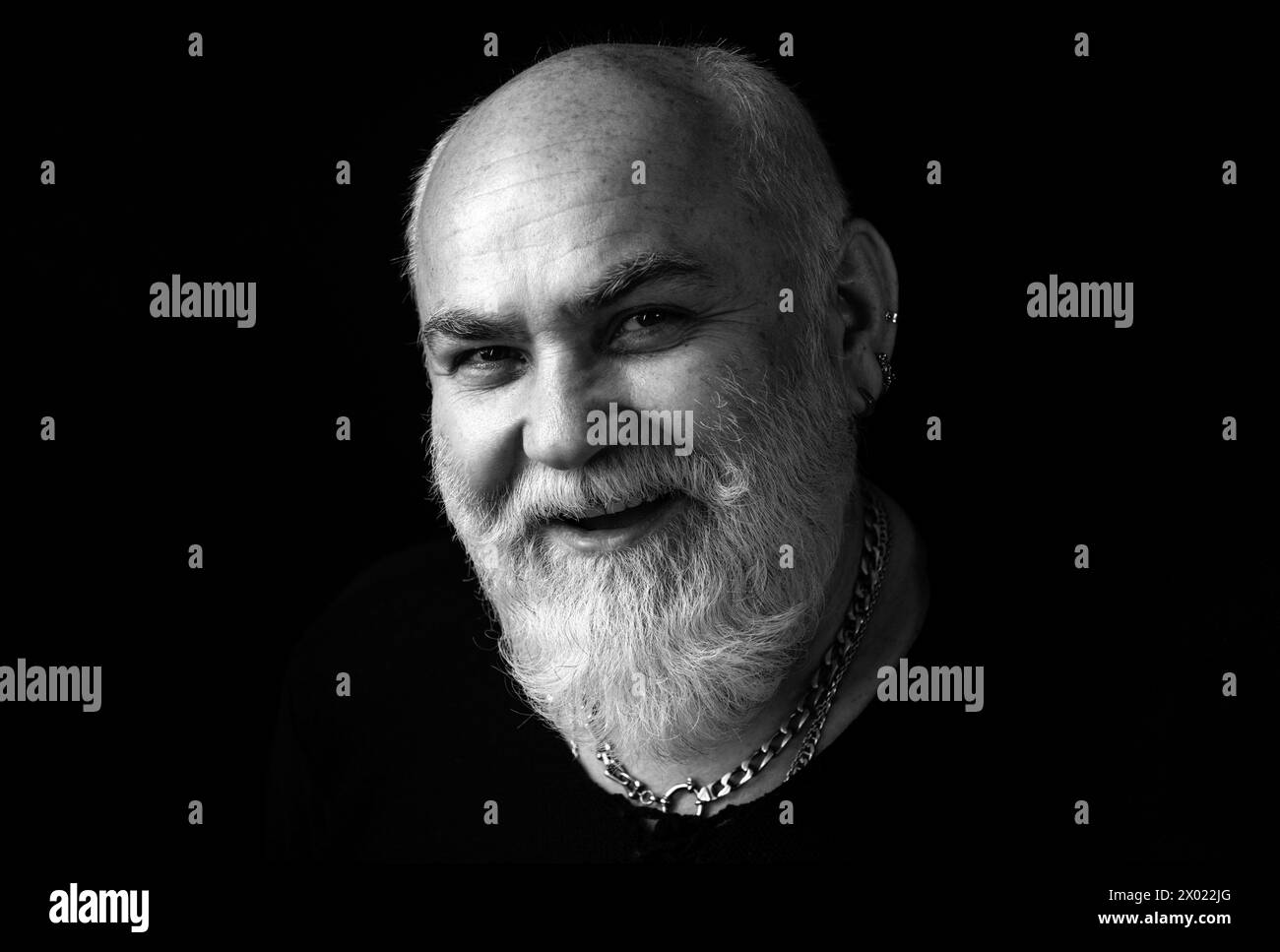 Happy retirement. Close up portrait of senior smiling pensioner looking ...