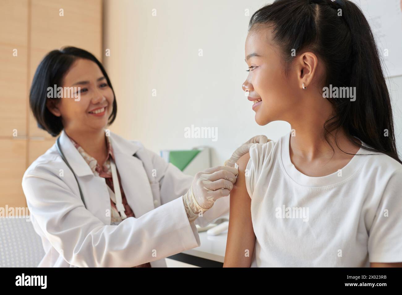 Teen girl arm doctor hi-res stock photography and images - Alamy