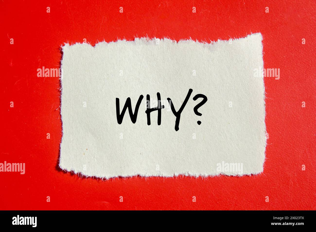 Why ? question written on ripped paper with red background. Conceptual ...