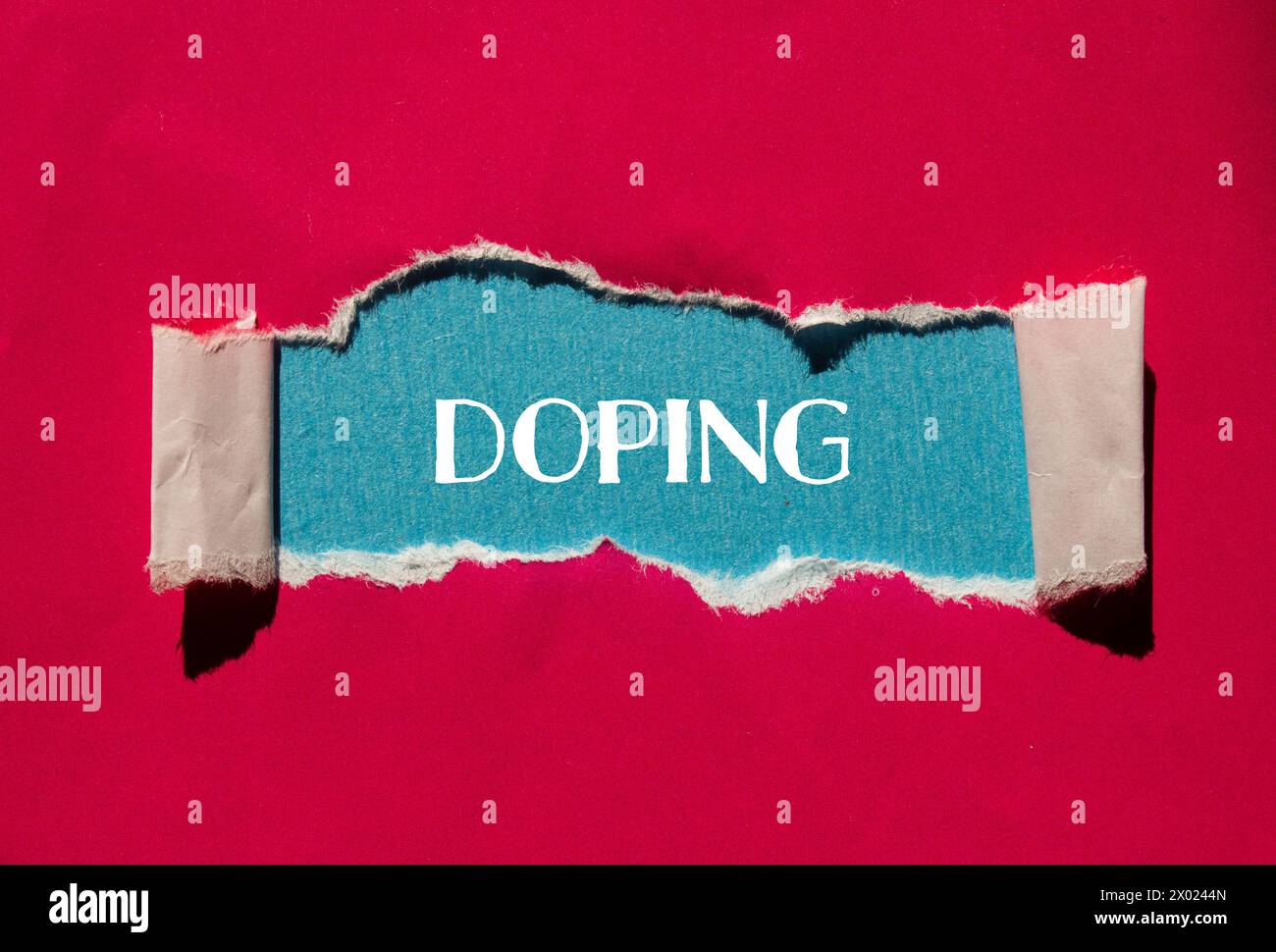 Doping word written on ripped red paper with blue background ... Doping word written on ripped red paper with blue background ...