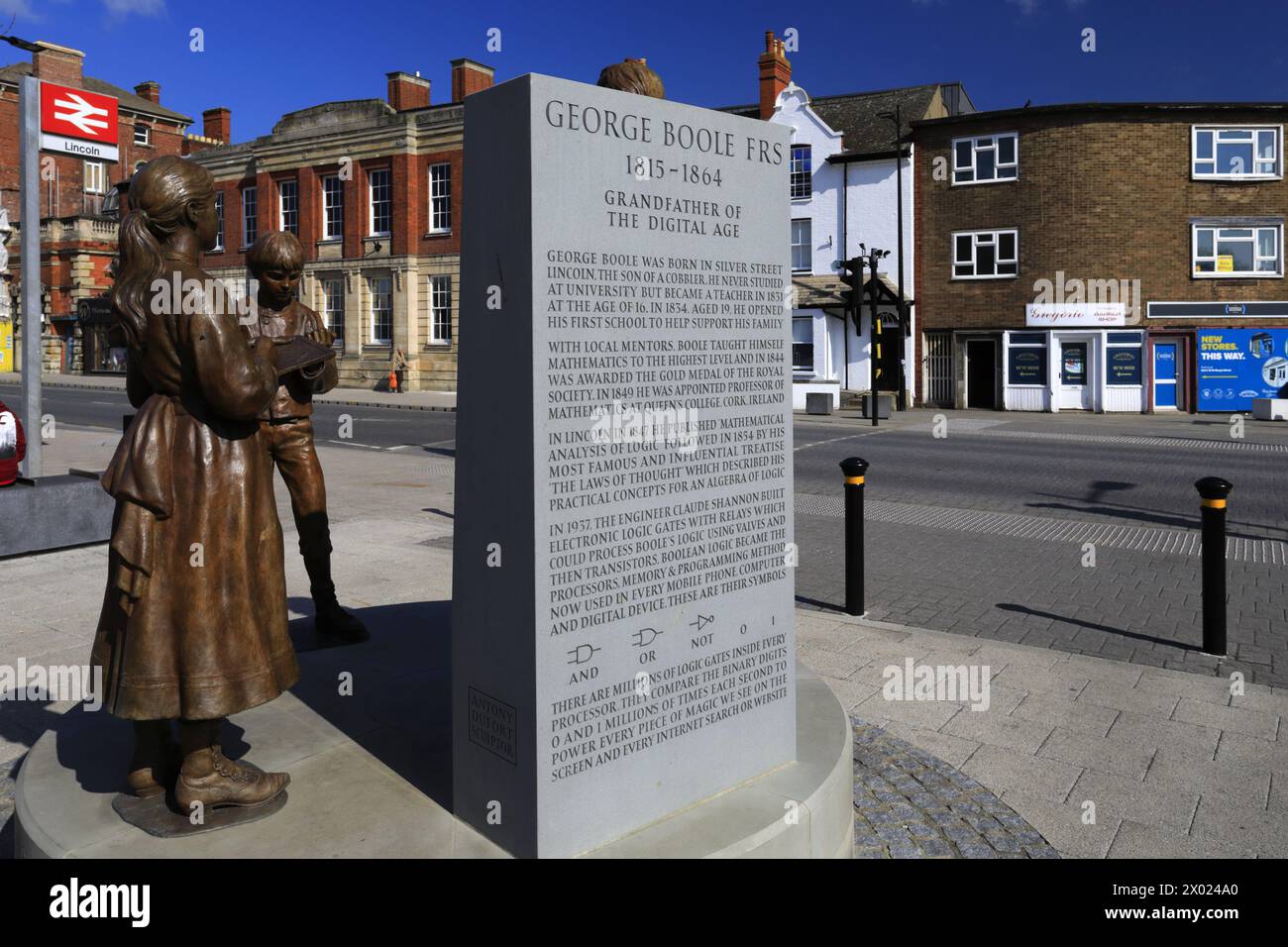 The George Boole statue outside Lincoln railway station, Lincolnshire ...