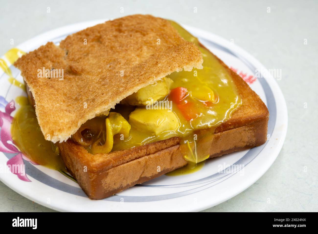 Curry coffin bread is a famous snack of Tainan in Taiwan Stock Photo ...