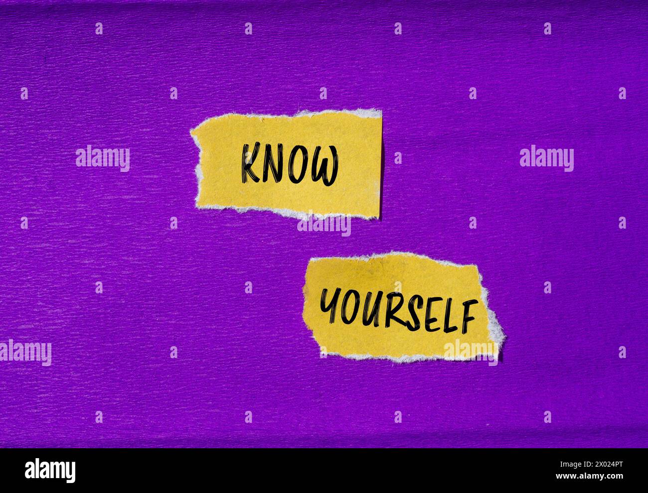 Know yourself words written on ripped paper with purple background ...