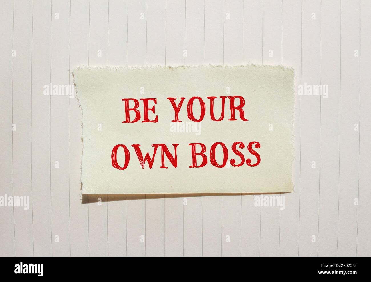 Be your own boss words written on ripped paper with notebook page ...