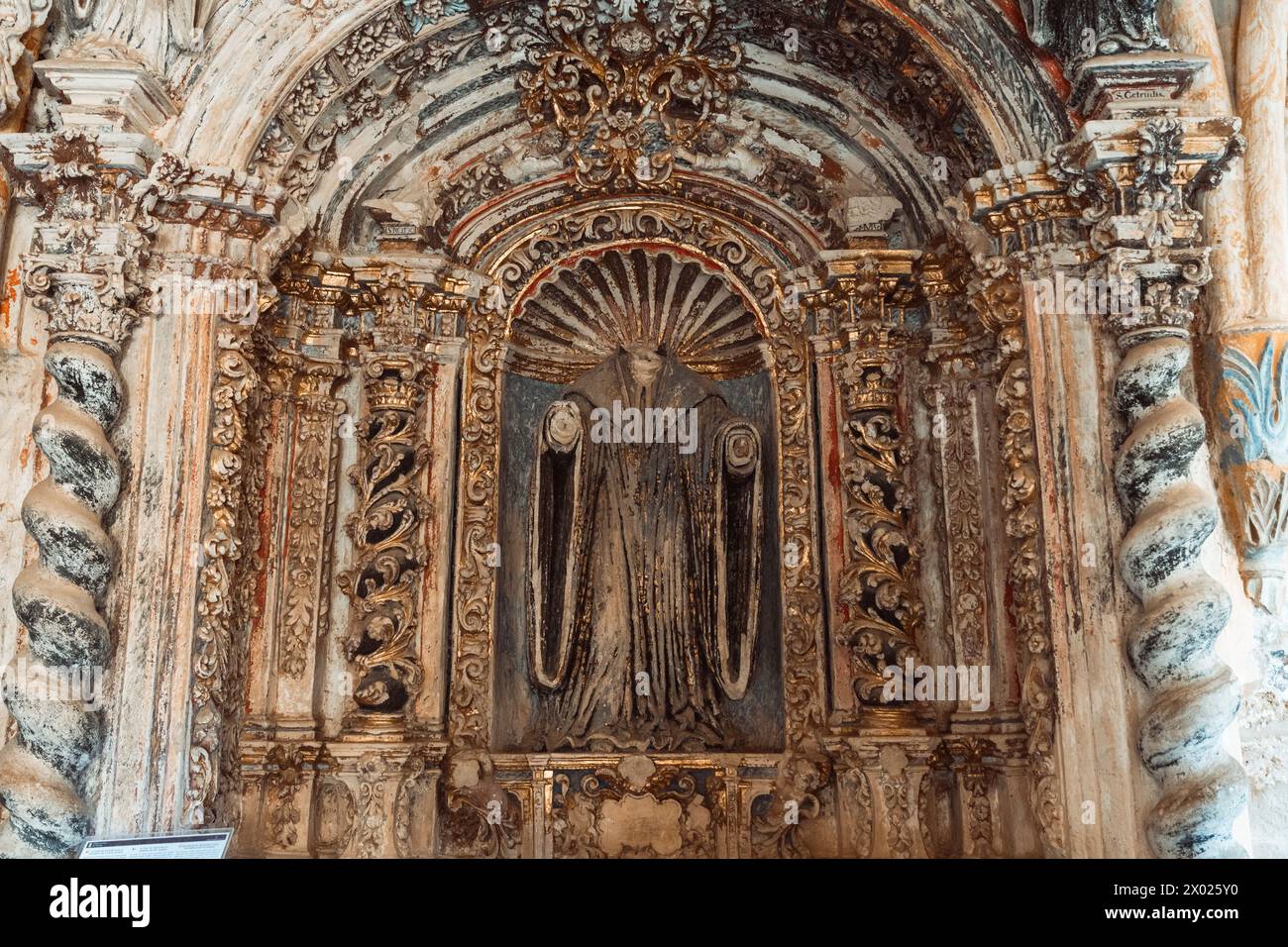 A detailed image showcasing the gilded remnants of a Baroque altar in ...
