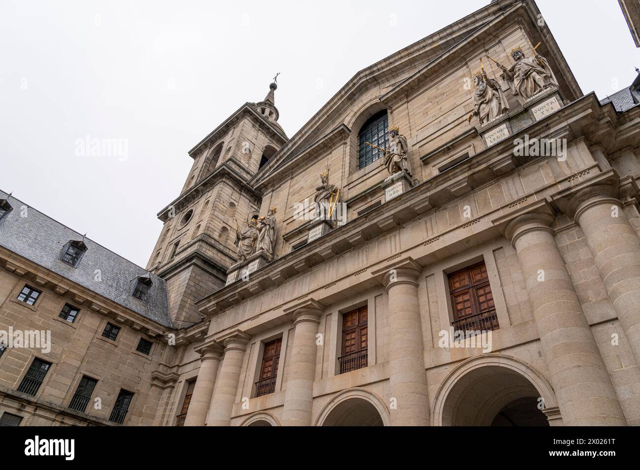Statues of historical figures stand over the main courtyard of El ...