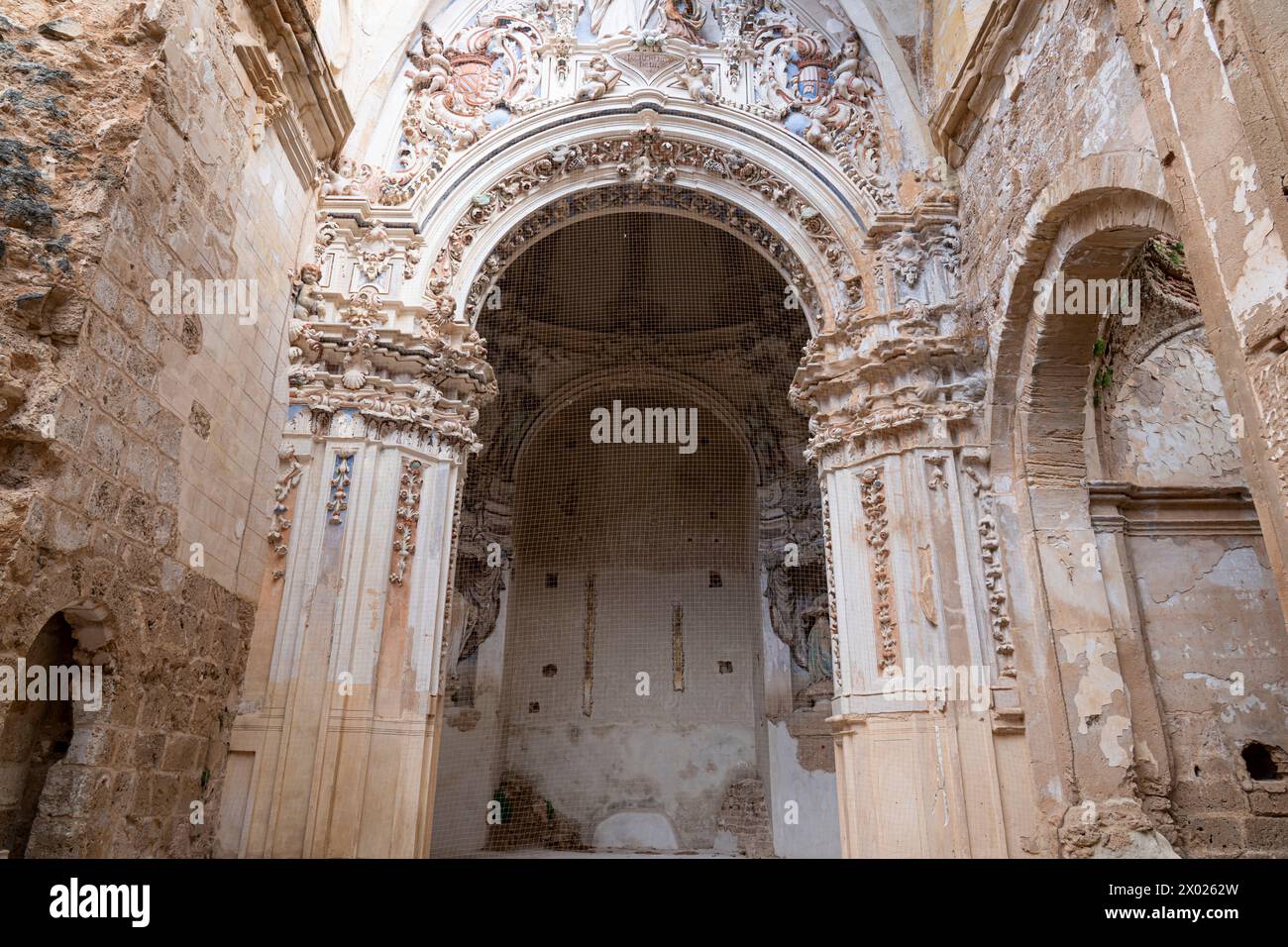 The complex Baroque portal stands resilient among the ruins of the ...