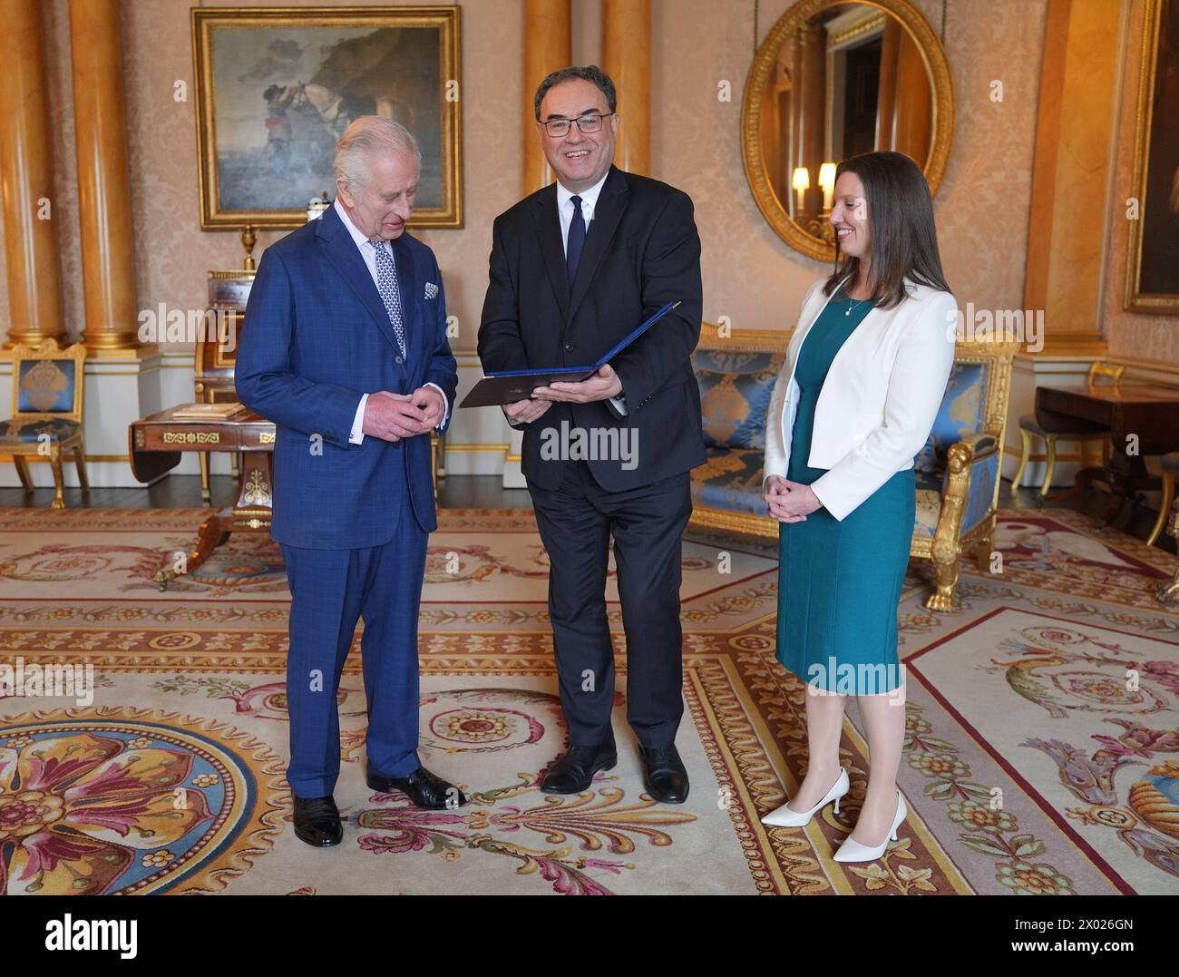 King charles iii (left) is presented with the first banknotes featuring ...