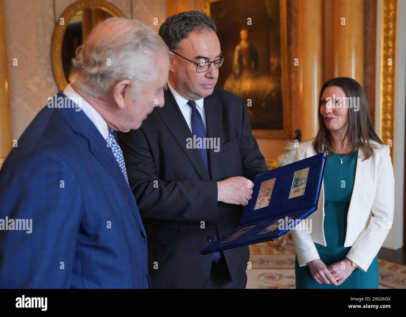 King charles iii (left) is presented with the first banknotes featuring ...