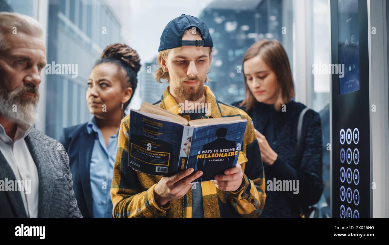 Young Handsome Office Intern Riding Crowded Glass Elevator in Modern ...