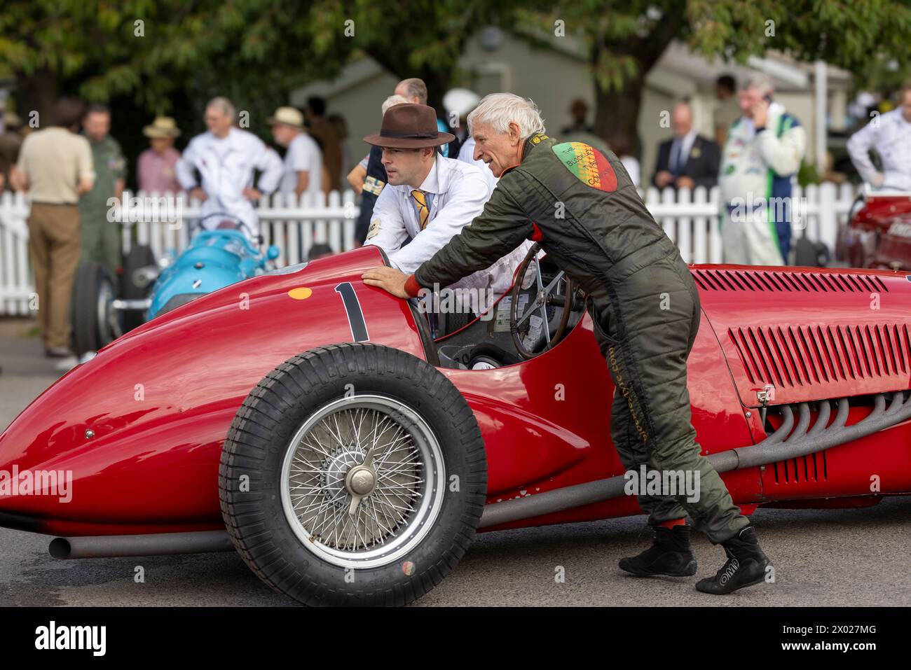 Julian Majzub helps roll his 1938 Alfa Romeo 308C into the holding ...