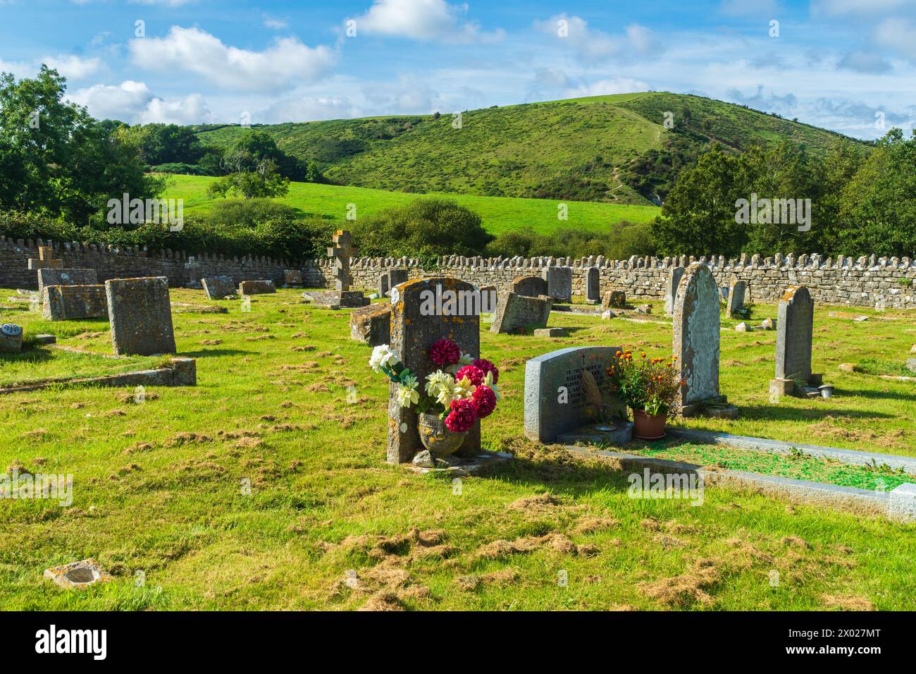 Corfe Castle, UK - September 14th 2023: Gravestones in the God’s Acre ...
