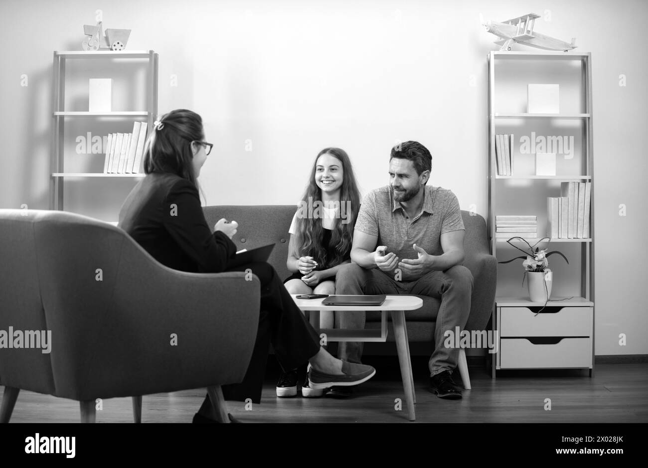 Psychologist helping father with daughter to solve child problems. Bad ...