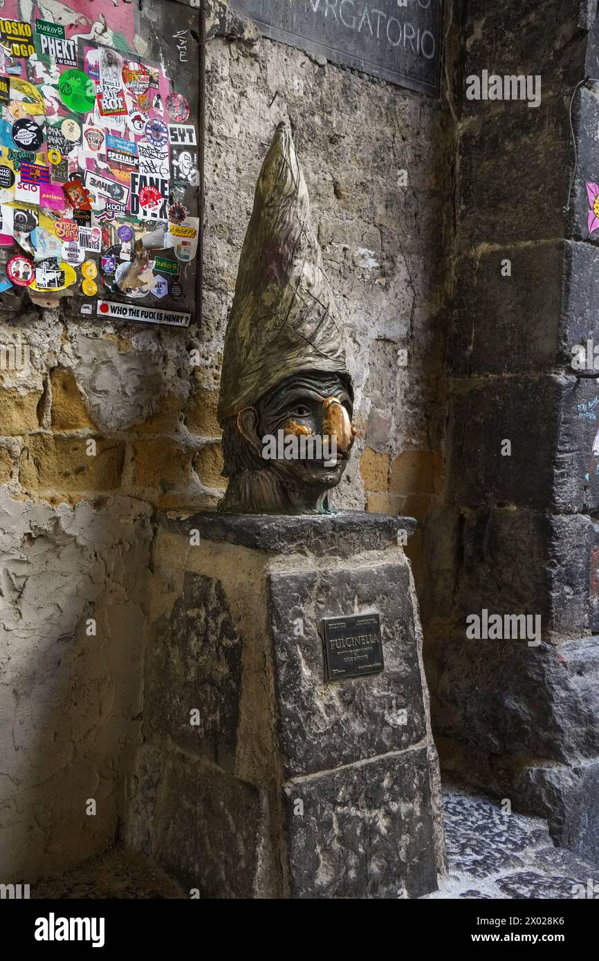 Pulcinella bronze statue, character in Neapolitan puppetry, touching ...